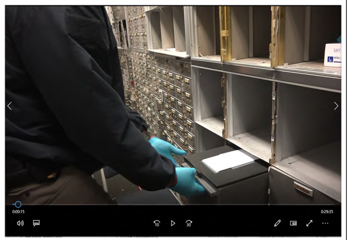 See the FBI Dig Through an Innocent Woman's Safe Deposit Box